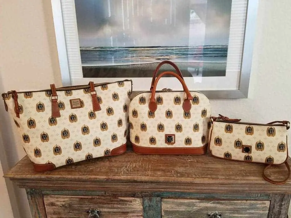 Disney Dooney and Bourke Club 33 Logo - Disney Dooney and Bourke Guide